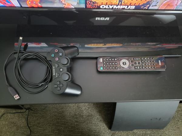 RCA TV + PS3 + Table + Guitar + Side table ($450)